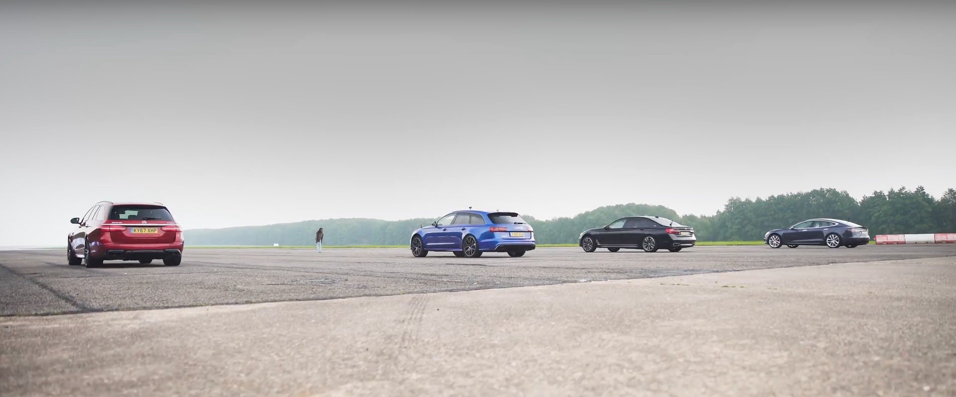 Tesla Model S beats German rivals in drag race
