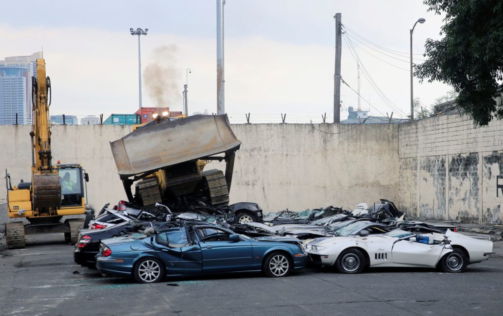 Philippines destroys 68 illegal luxury cars